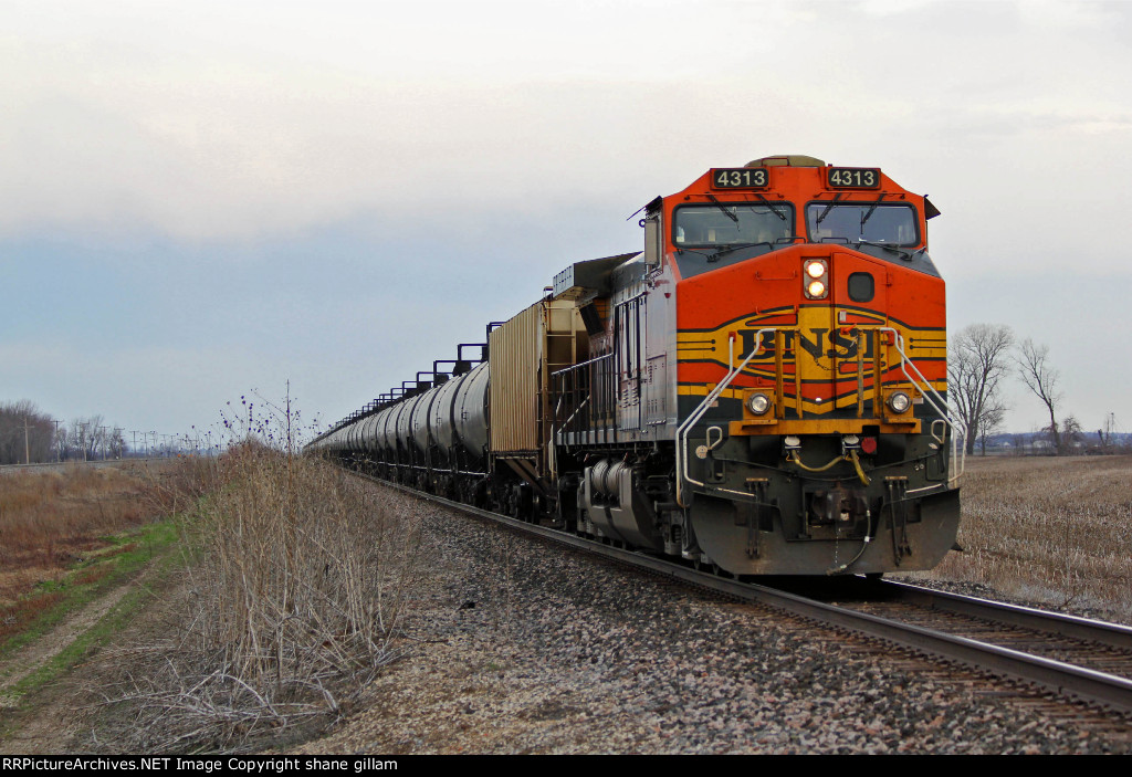 BNSF 4313 Works dpu on a Wb tank train.